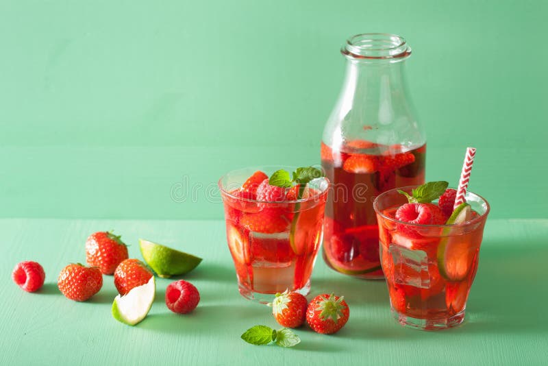 Summer Strawberry Raspberry Lemonade with Lime and Mint Stock Photo ...