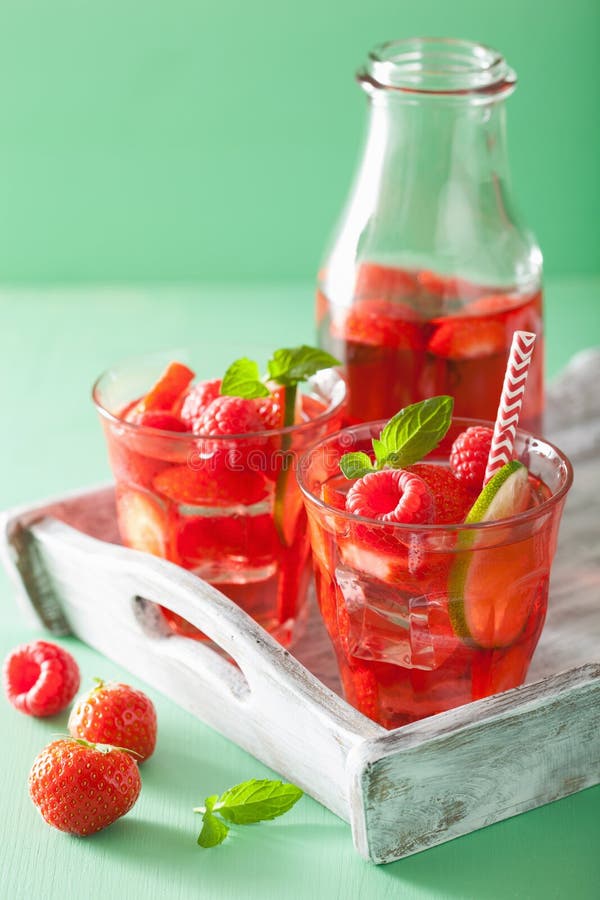 Summer Strawberry Raspberry Lemonade with Lime and Mint Stock Photo ...