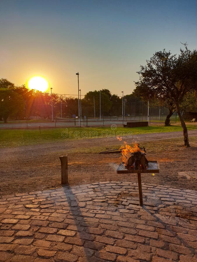 Summer Sunset with Fire Burning Stock Image - Image of burning, summer ...