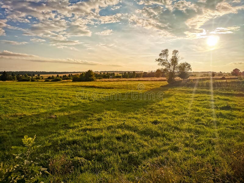 Summer Sunset in the Green Plains Stock Image - Image of coulds ...