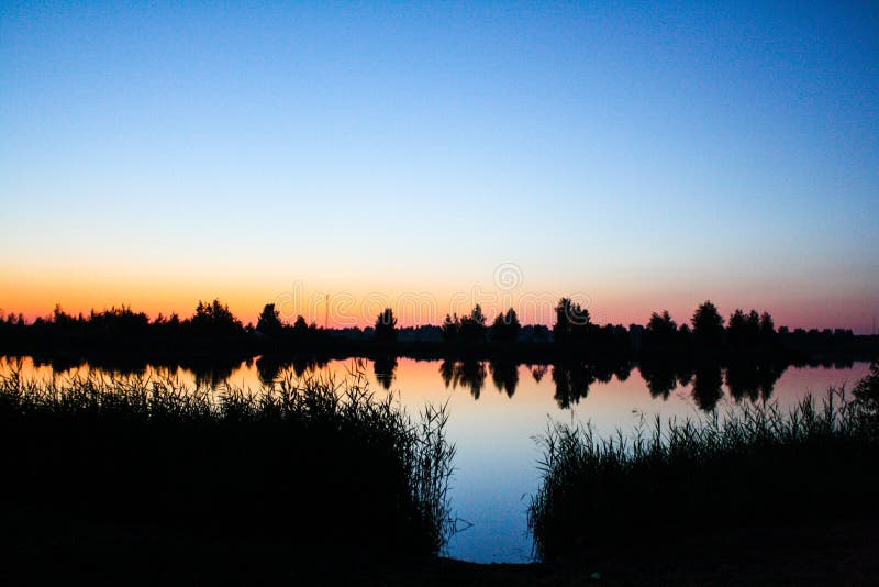 Summer Sunset Over the Lake Stock Image - Image of bright, sunset ...
