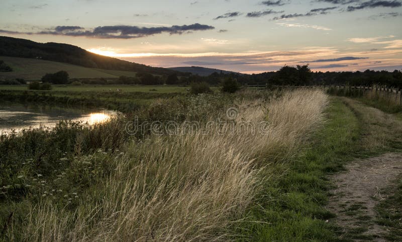 Summer Sunset Reflected in River in Countryside Landscape during Stock ...