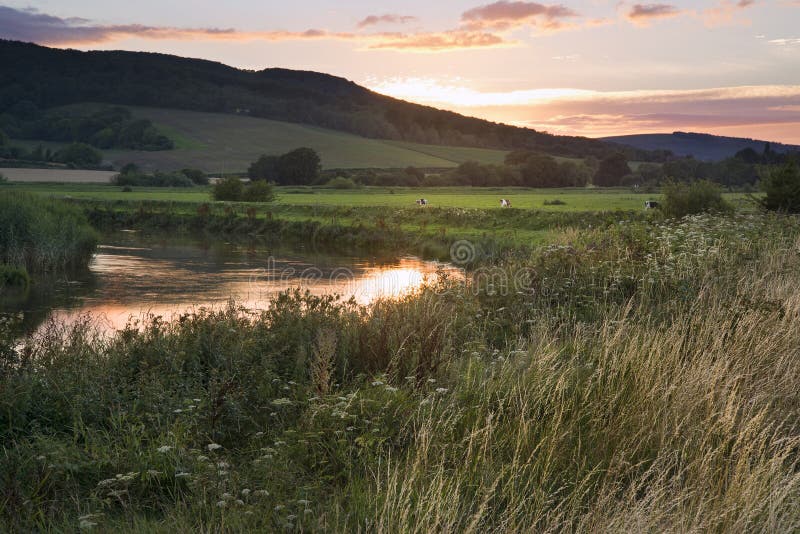 Summer Sunset Reflected in River in Countryside Landscape during Stock ...