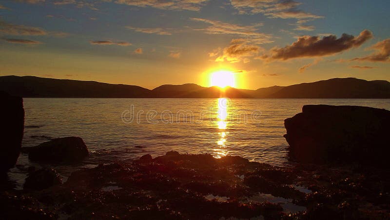 Summer Sunsets in Scotland stock image. Image of pebbles - 192087051