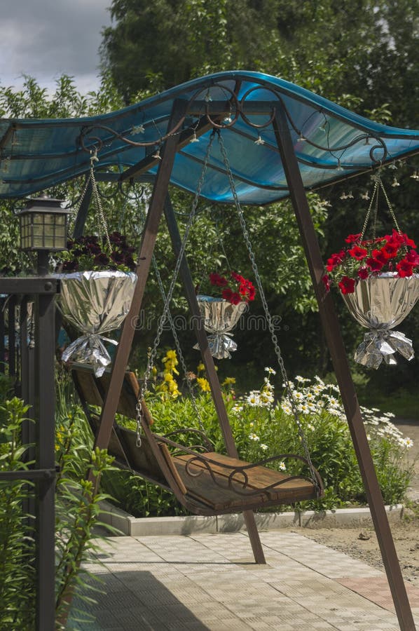 Summer Swing Decorated with Flowers 2 Stock Photo - Image of grass ...