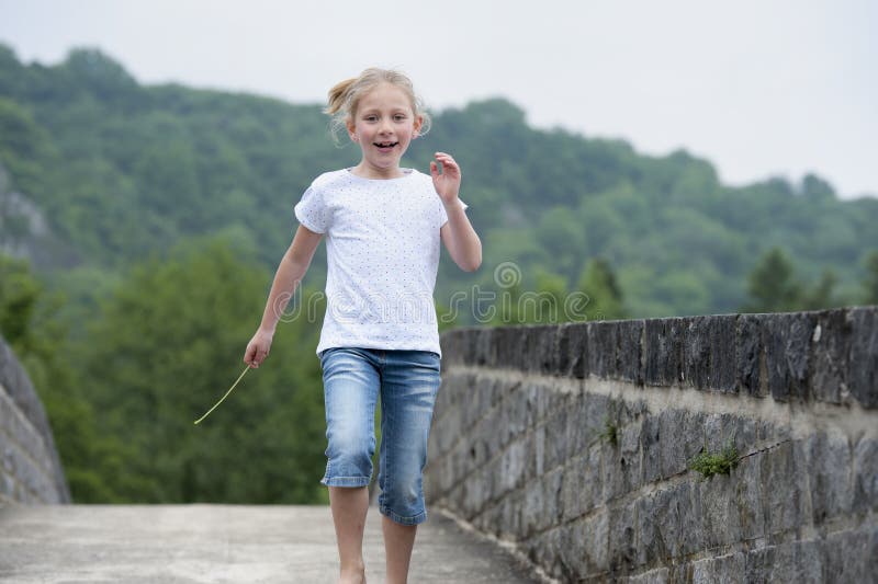 Summer Time : Little Girl Running on a Bridge Stock Image - Image of ...