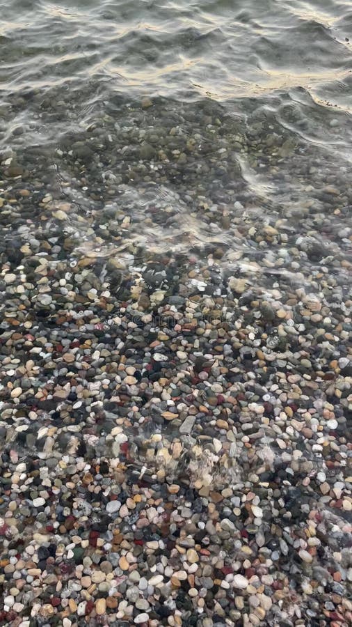 Summer Time and Pebbles on the Beach Stock Video - Video of arch ...