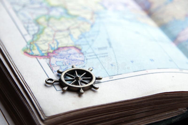 Summer Travel Idea. Smoll Nautical Steering Wheel and Map. Stock Photo ...