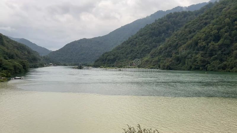Two Rivers with Different Water Colors Merge in Georgia Stock Video ...