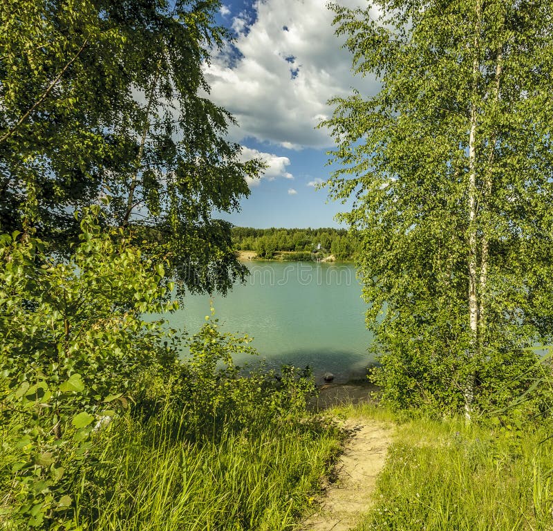 Summer Vacation on the Banks of an Old Quarry with Turquoise Water ...