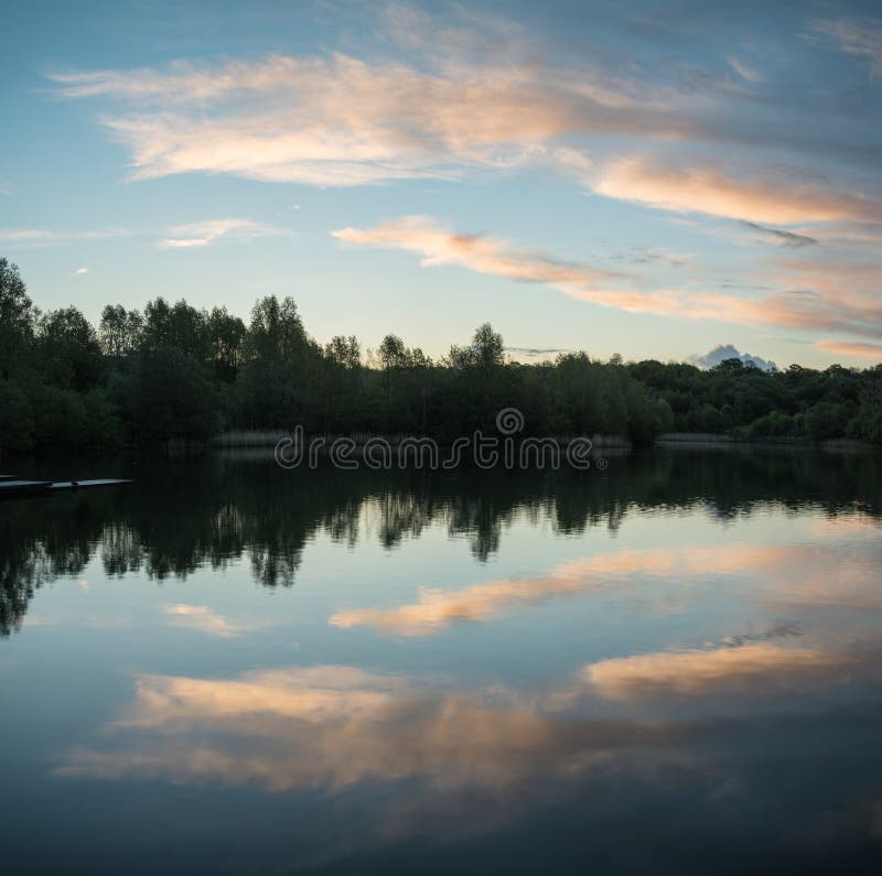 Summer Vibrant Sunset Reflected in Calm Lake Waters Stock Photo - Image ...