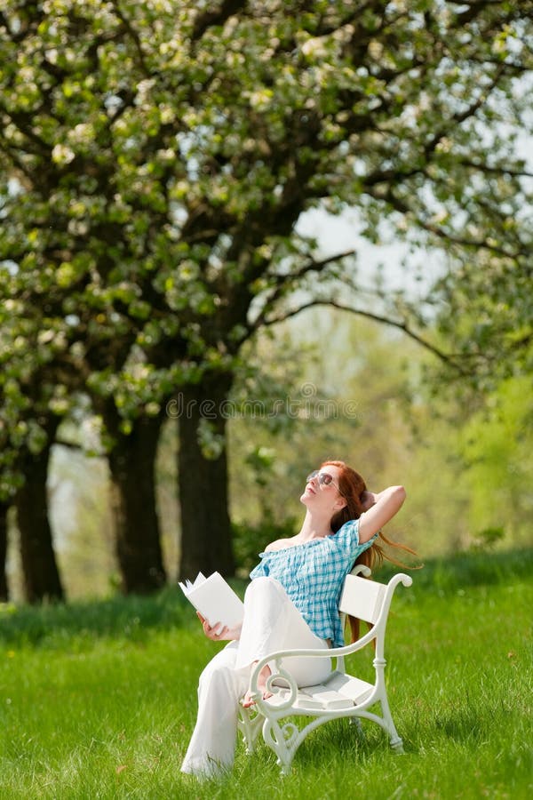 Summer - Woman Relax Under Blossom Tree Picture. Image: 9376602