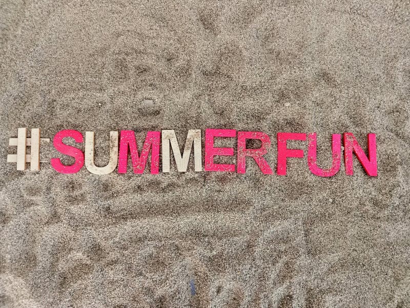 #summerfun Summer Fun Written on the Sand at the Beach Stock Image ...