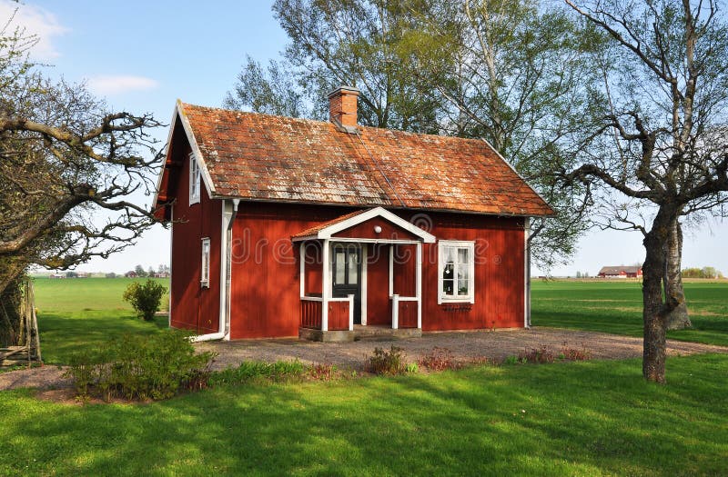 A Traditional Finnish Wooden Cottage With A Sauna And A Barn On The ...