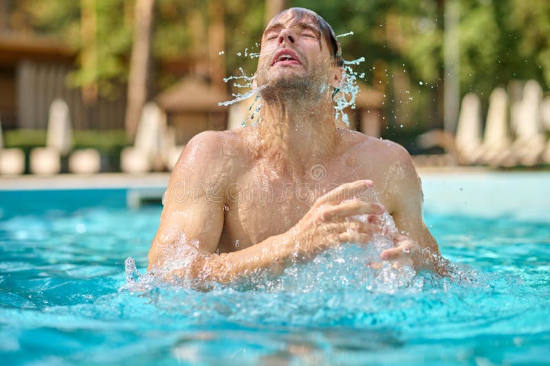 A Picture of a Young Handsome Man in a Swimming Pool Stock Image ...