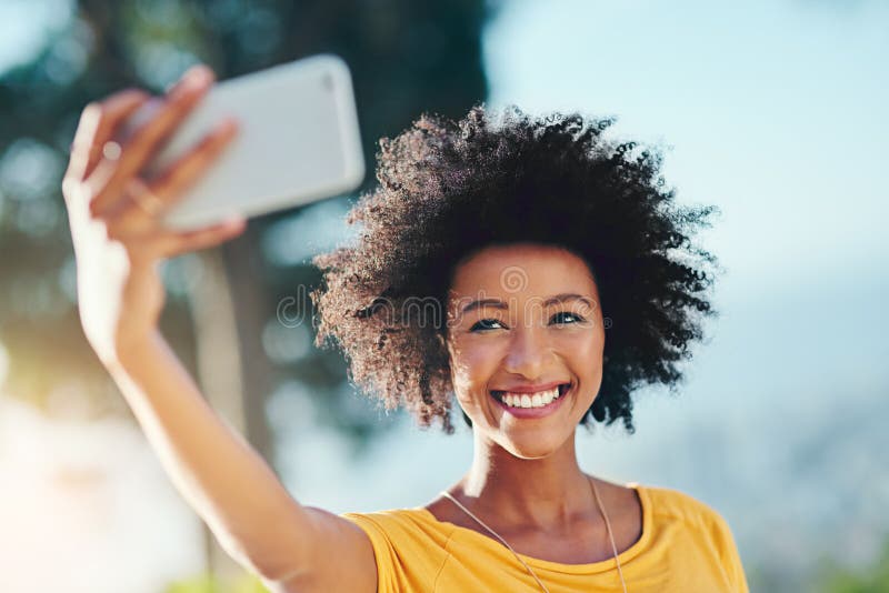 Summertime Selfies An Attractive Young Woman Taking Selfies While