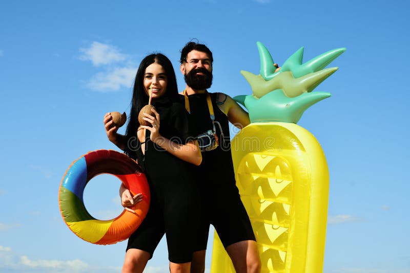 Summertime Vacation Summer Couple Concept Woman In Swimsuit And Man With Inflatable Mattress