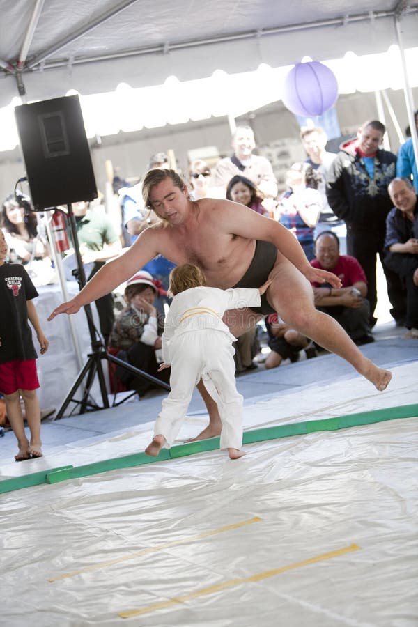 Sumo Wrestler and Child editorial photo. Image of culture - 9109311