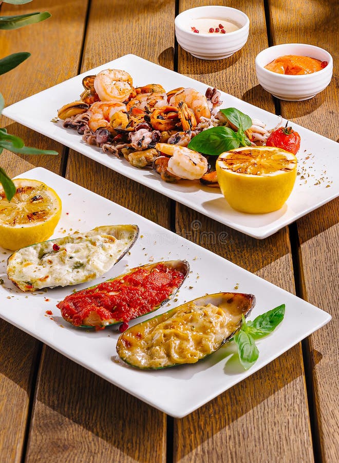 Gourmet Mediterranean Feast on Rustic Wooden Table Stock Photo - Image ...