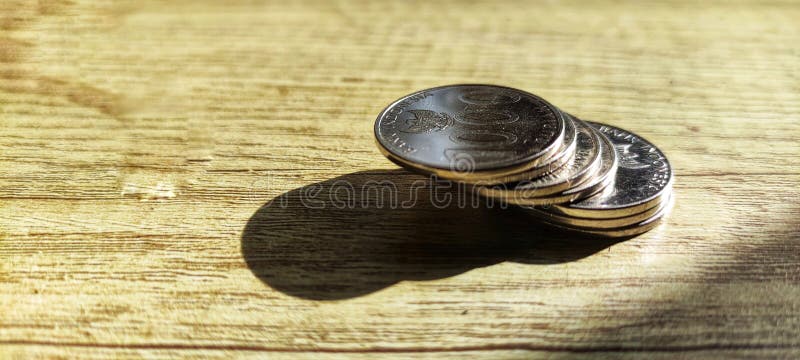 Shadows Appear on Coins Arranged Vertically Stock Photo - Image of ...