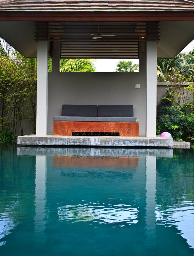 Sun-bathing Chairs with Swimming Pool Stock Image - Image of patio ...