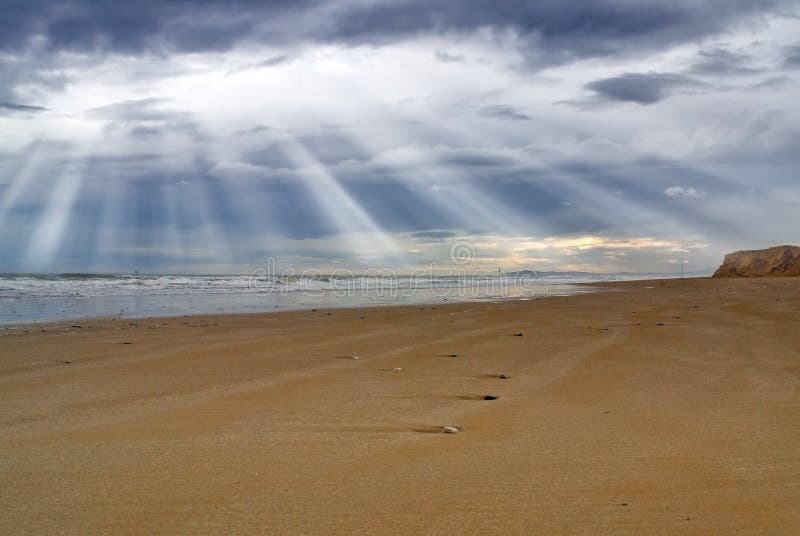 Sun beam over the beach stock image. Image of sand, marine - 20218391