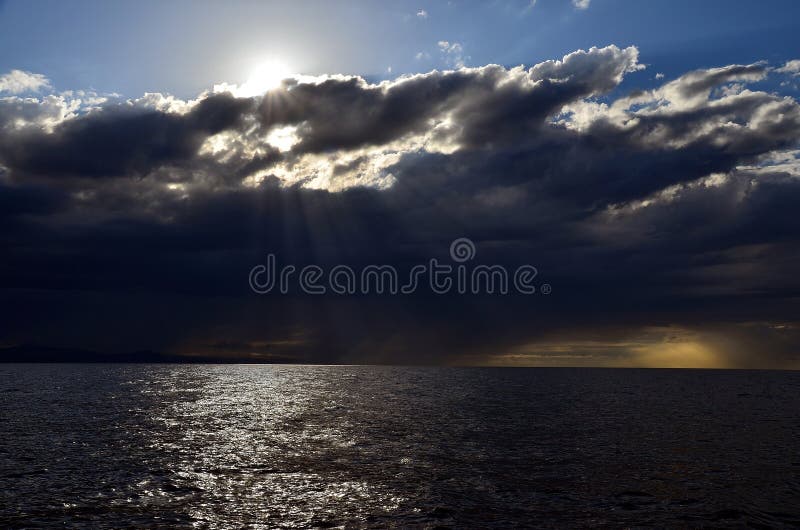 Sun beam over the sea stock photo. Image of blue, nature - 67477448