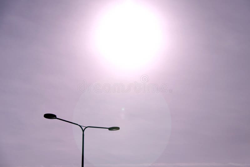 Sun Beaming Down on a Lamppost. Stock Image - Image of beams, lamppost ...