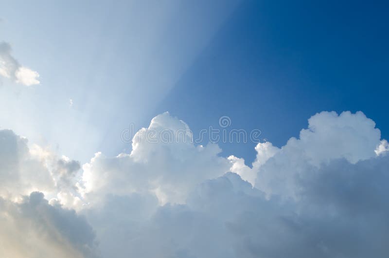 Sun Beams through Clouds with Blue Sky Stock Photo - Image of ...