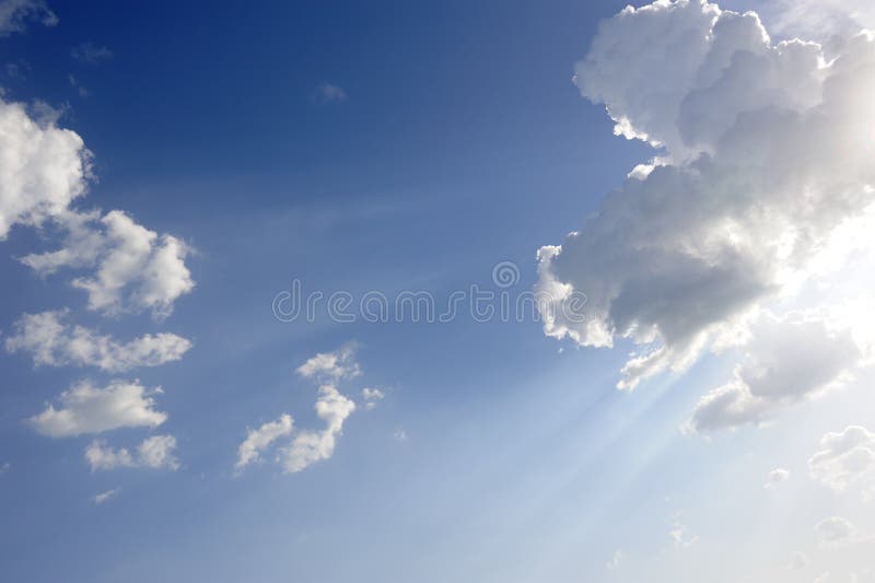 Sun Beams Over Blue Sky and Clouds Stock Photo - Image of fluffy, light ...