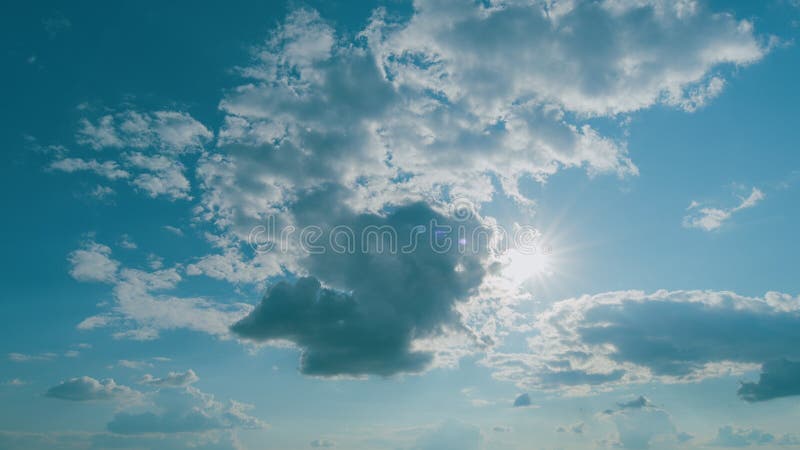 Sun Beams or Rays with Clouds at Day. Dramatic Blue Sky with Sun ...