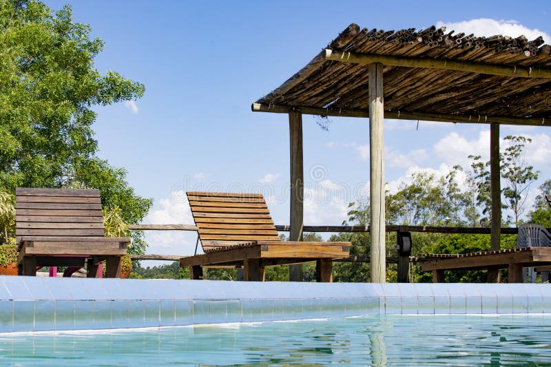 Sun-beds Near a Swimming Pool To Relax. Holidays in Brazil Stock Image ...