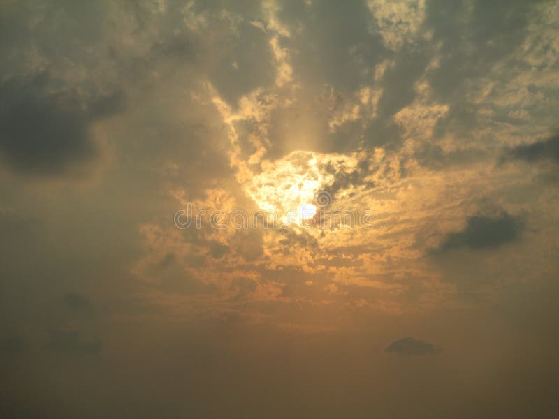 Sun Behind Clouds Divine Light Stock Photo - Image of storm, clouds ...