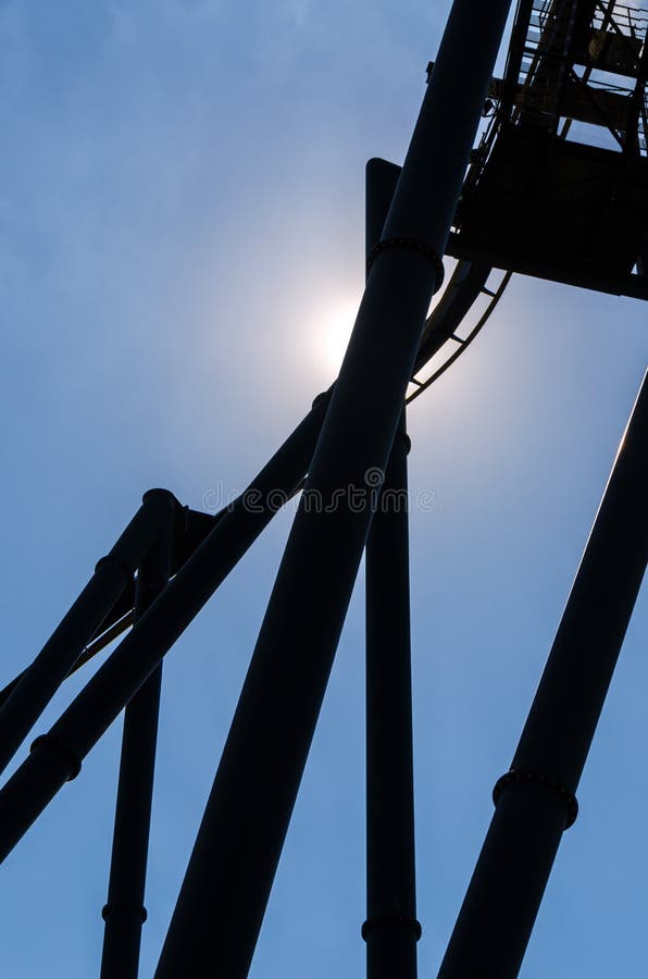 Sun Behind the Roller Coaster Stock Photo - Image of abstract, steel ...