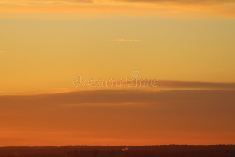 Sun Below the Horizon and Clouds in the Fiery Dramatic Orange Sky at ...