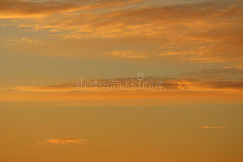 Sun Below the Horizon and Clouds in the Fiery Dramatic Orange Sky at ...