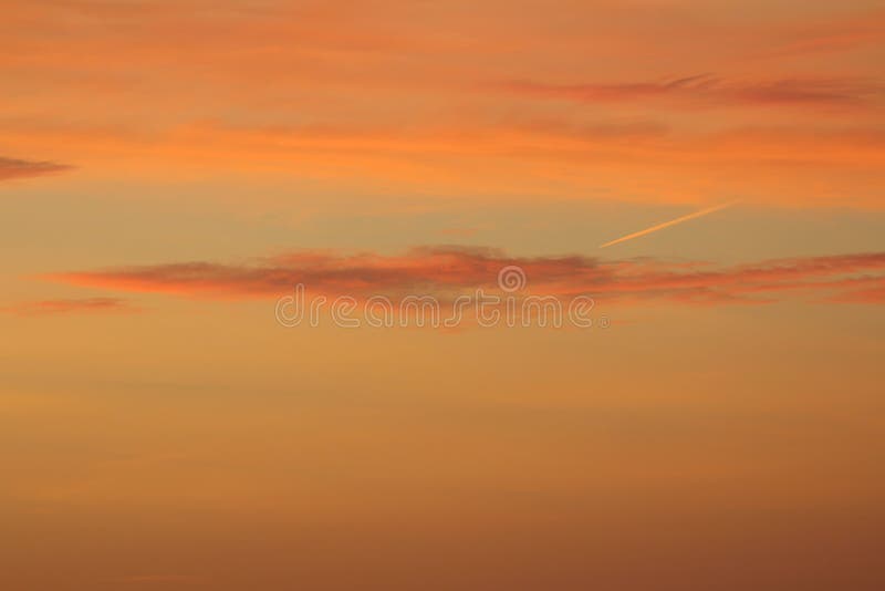 Sun Below the Horizon and Clouds in the Fiery Dramatic Orange Sky at ...