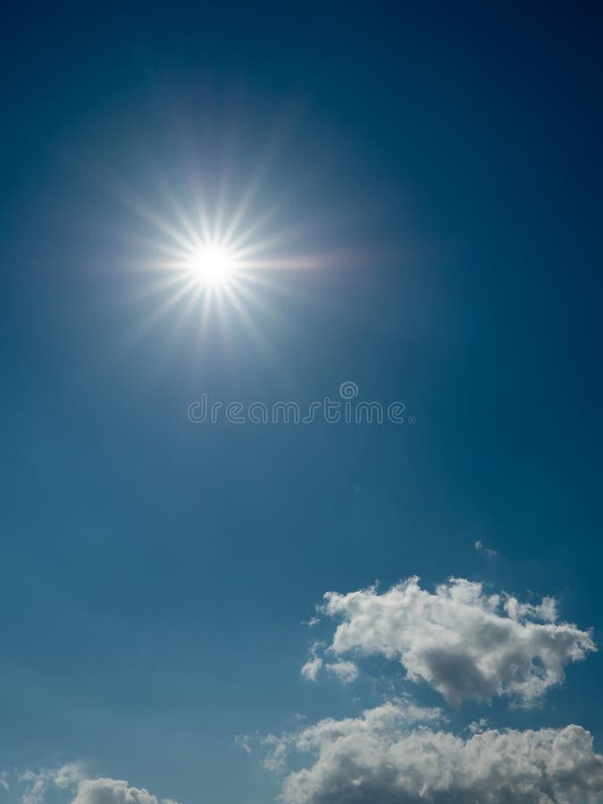 Sun in a Blue Cloudy Sky. Vertical Image for Design Purpose and Sky ...