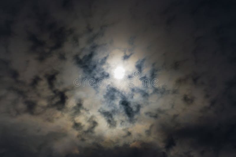 Sun Breaks through Bizarre Ominous Clouds Stock Photo - Image of ...