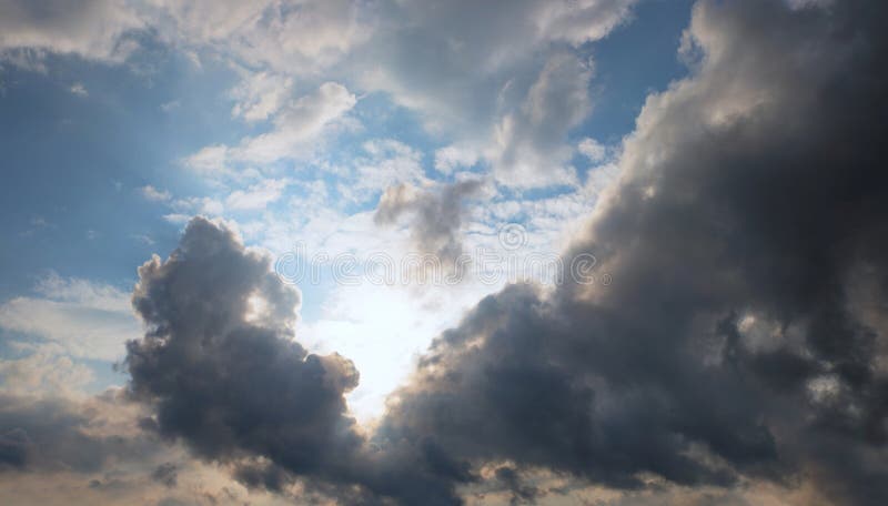 The Sun Breaks through Grey Clouds after a Heavy Thunderstorm Stock Image - Image of grey ...