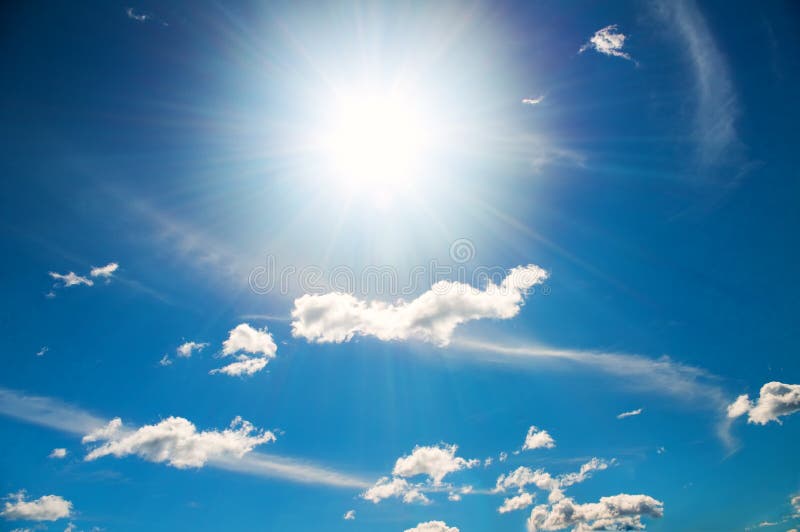 Sun in a bright blue sky. stock photo. Image of realistic - 75957198