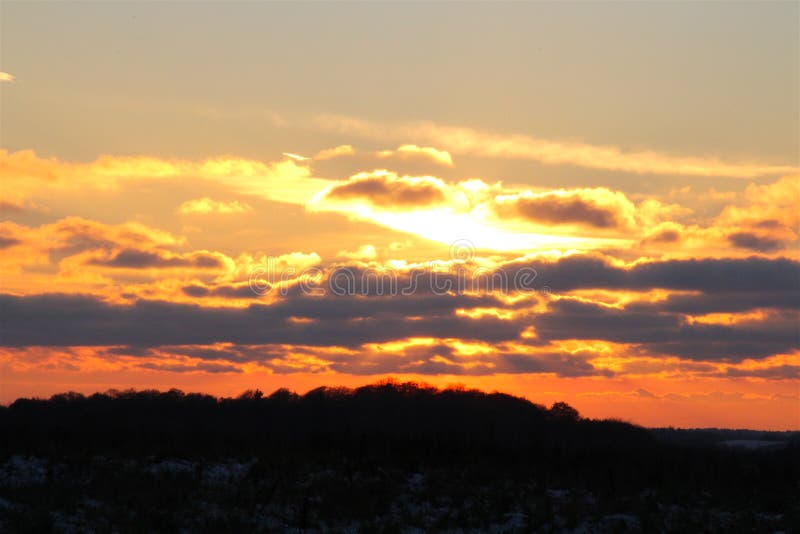 The Sun Caught in the Clouds Stock Image - Image of november, yellow ...