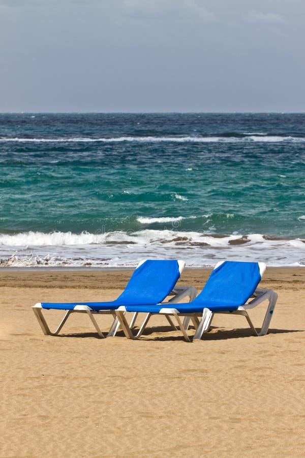 Sun chairs stock photo. Image of surf, color, chair, coast - 20791438