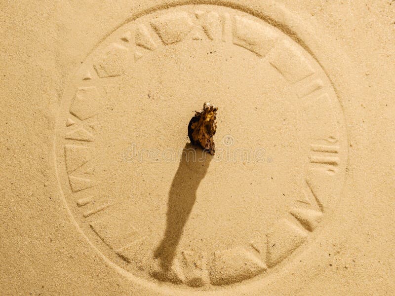 Sun clock on sand stock photo. Image of aging, astronomy - 114276938