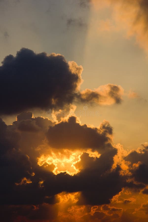 SUN in CLOUDS stock photo. Image of dawn, threat, dark - 27203240