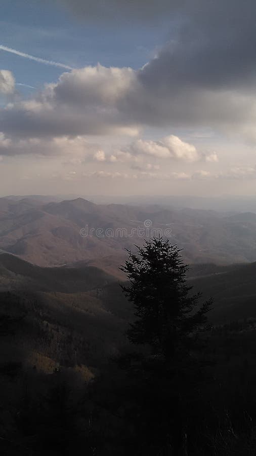 Sun through Clouds Over Mountains and Valleys Stock Image - Image of ...
