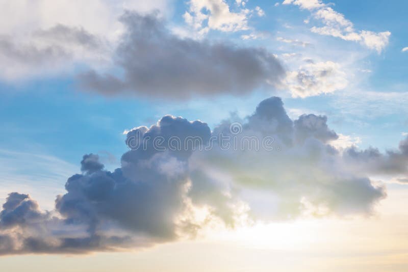 The Sun in Clouds. the Sun Shines through the Dark Gray Clouds ...