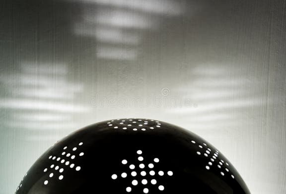 The Sun in a Colander. Rays of Light through the Holes Stock Photo ...
