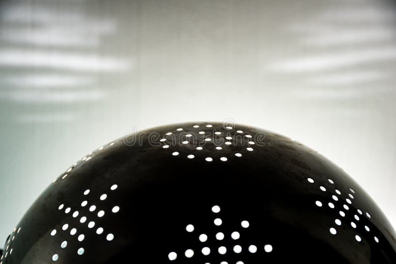 The Sun in a Colander. Rays of Light through the Holes Stock Image ...