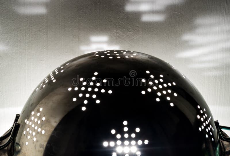 The Sun in a Colander. Rays of Light through the Holes Stock Photo ...